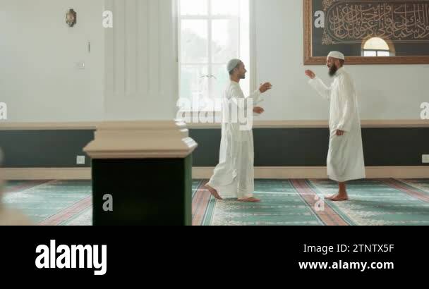 Muslim, Islam and people hug in mosque for community, support and ...