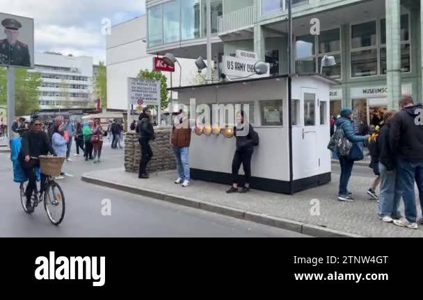 Tourists at Checkpoint Charlie one of the most visited landmarks of ...