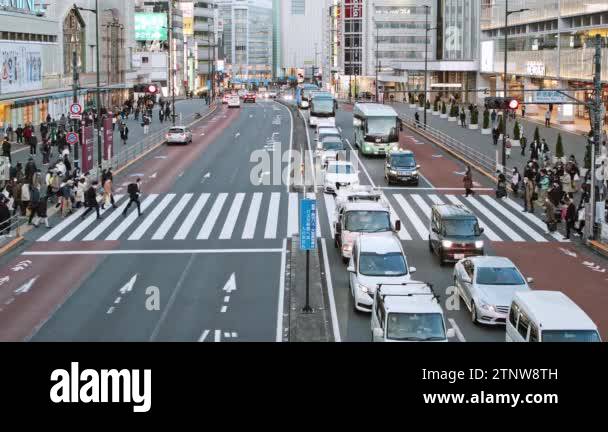 Tokyo, Japan - Dec 2, 2022: Car traffic transportation, Japanese people ...