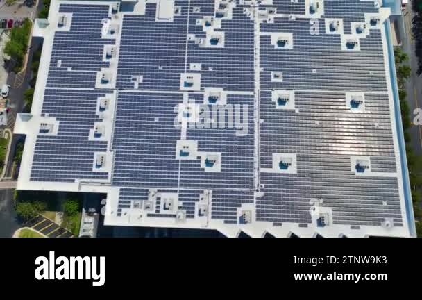 Electric photovoltaic solar panels installed on shopping mall building ...