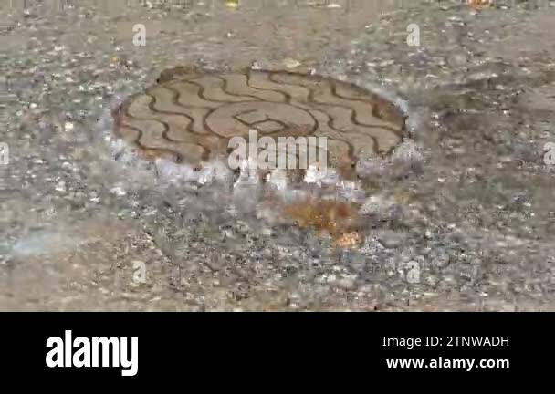Outflow of water from the aqueduct. Breakthrough of the water supply ...