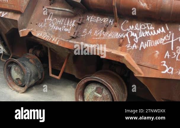 Rusty, burned-out Russian military equipment on Khreshchatyk in Kyiv. Tanks, armored personnel ...