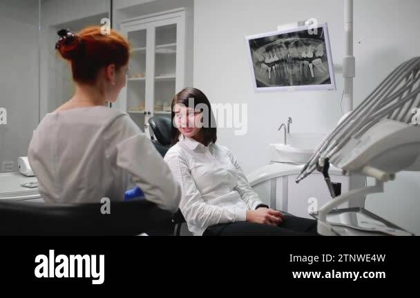 Beautiful girl consulted a dentist in his office ball on the thymus of ...