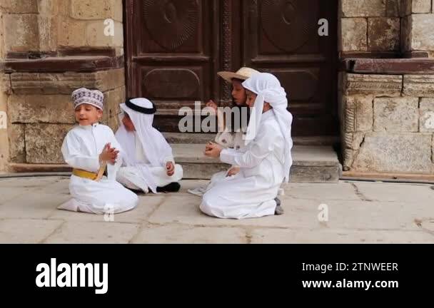 Saudi Arabian kids playing outside the house in Jeddah old town Saudi ...