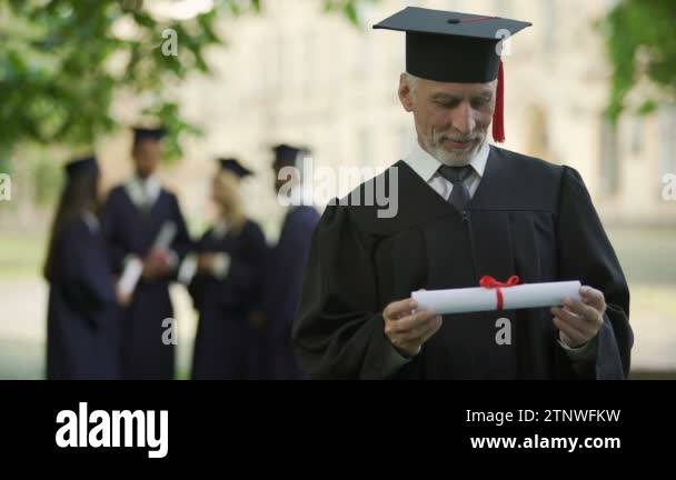 Man holding degree certificate Stock Videos & Footage - HD and 4K Video ...