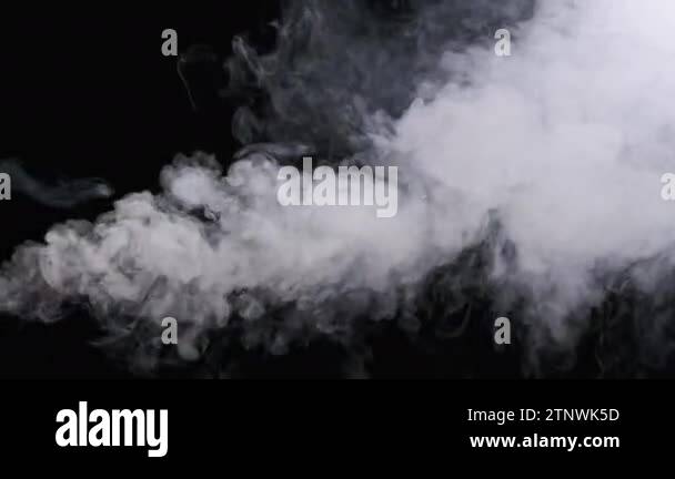 Jet stream of smoke or vapor on black background in slow motion 4K ...