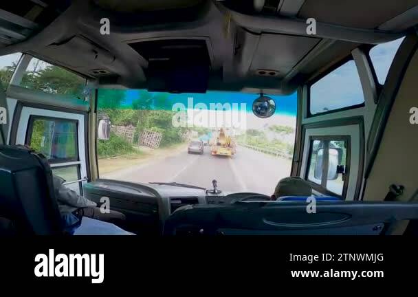 Bus riding in an intercity bus. Bus traveling View from the front seat ...