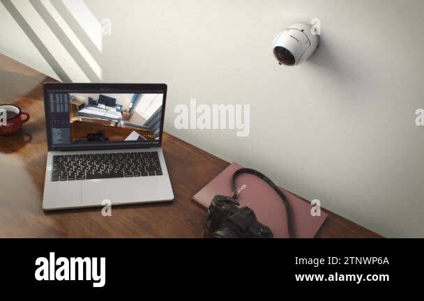 Modern security camera installed on the wall, online connected to ...