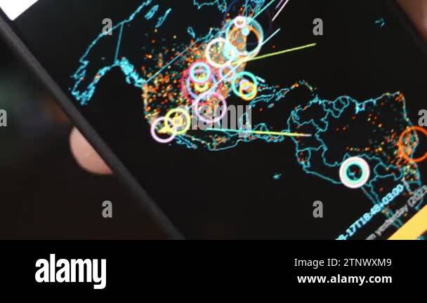 Cyber attack map navigation on smartphone. Displays Show Various ...