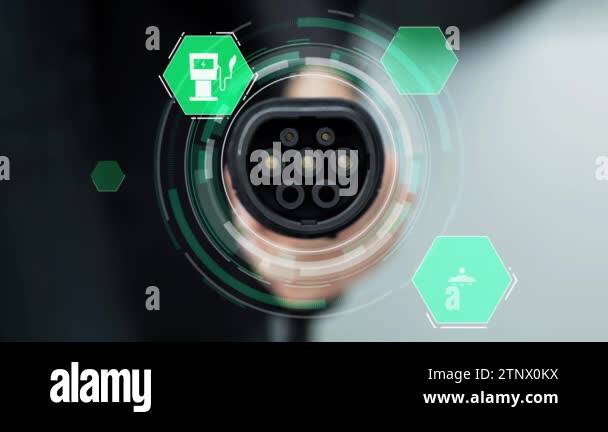Focus EV charger pointing in front of camera display futuristic eco ...
