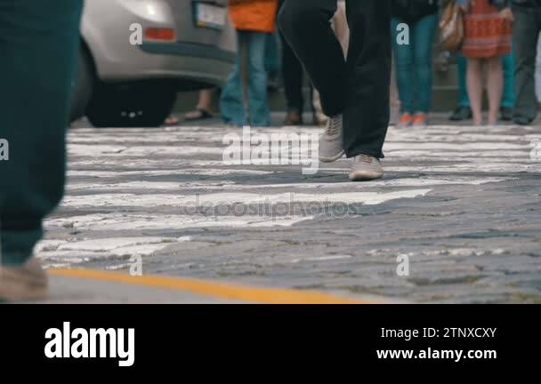 Feet of Crowd People Walking on the Pedestrian Crossing in Slow Motion ...