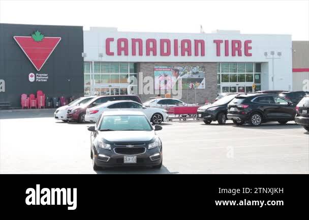 big large canadian tire retail store with parking lot in front with ...
