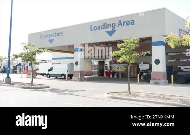 contractors and loading area with signs on roof ceiling facade rain ...