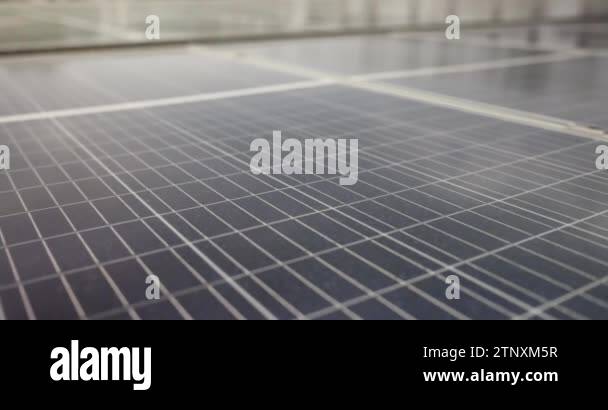 Fixed solar panels on roof of building in sunny weather. Concept of ...