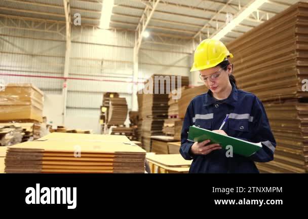 Portrait worker professional young beautiful woman warehouse worker ...