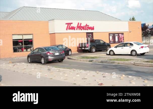 tim hortons restaurant coffee shop drive thru busy with cars vehicles ...