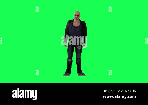 Criminal man and drug addict gangster with athletic body in green ...