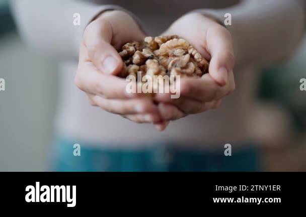 Hands holding nuts Stock Videos & Footage - HD and 4K Video Clips - Alamy