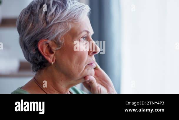 Senior woman, thinking and sad in home with depression, anxiety and ...