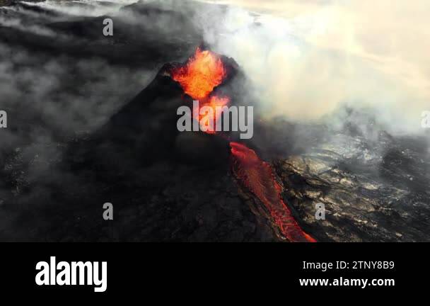 Volcano eruption, Red hot burning lava erupts from ground in Iceland ...