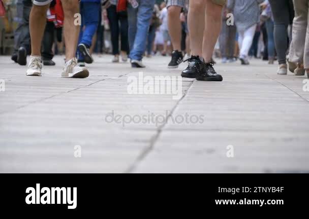 Legs of Crowd People Walking on the Street in Slow Motion Stock Video ...