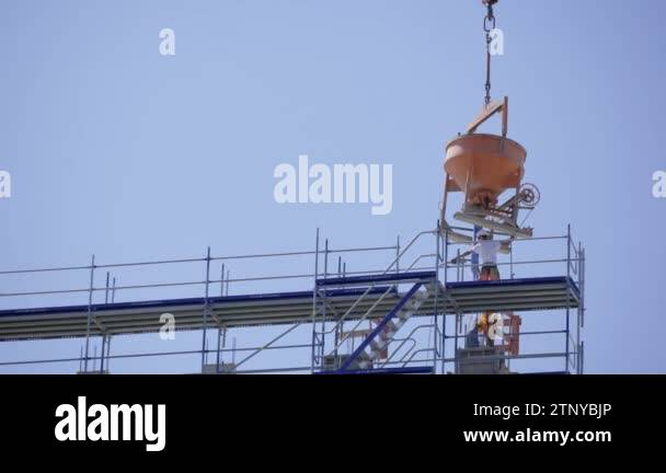 Crane lifting cement container construction Stock Videos & Footage - HD ...