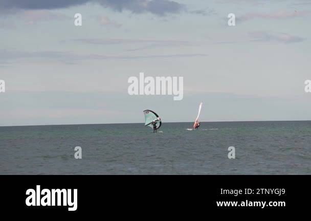 Modern water sport. Hydrofoil ride on the ocean using the wing and the ...