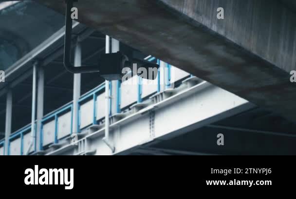 Outdoor surveillance cameras installed in the city under the bridge to ...