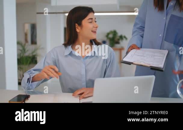 Young entrepreneur working office laptop. Manager assistant bringing ...