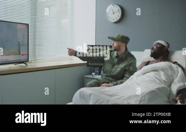 Soldier watching tv Stock Videos & Footage - HD and 4K Video Clips - Alamy