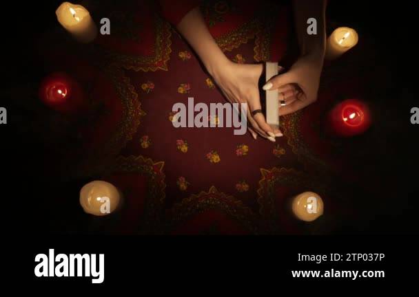 Fortune teller session scene, top view. Close up shot of a female ...