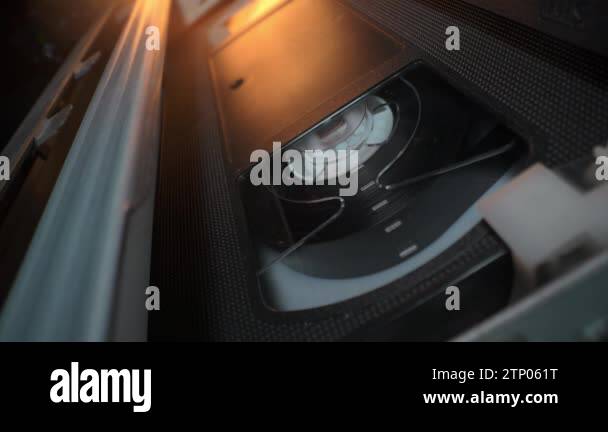 VCR VHS mechanism inside, video cassette player playing, magnetic head ...