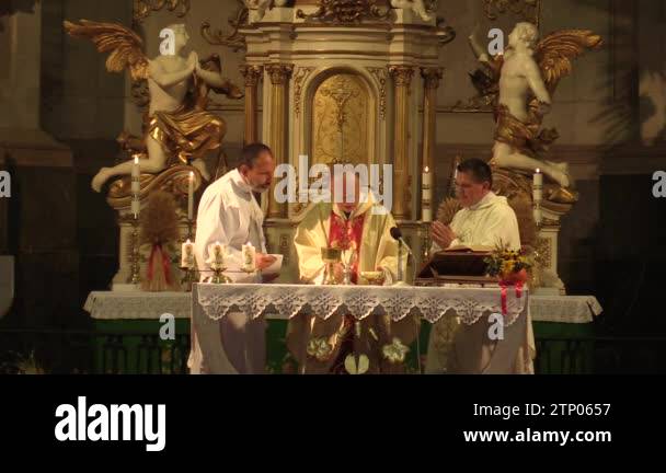 Catholic christian mass harvest and liturgy worship, parish priest and ...