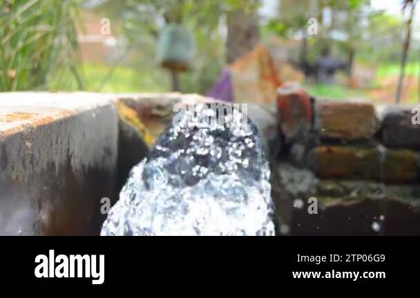 FHD footage of water coming out from tube well pipe. Concept of ...