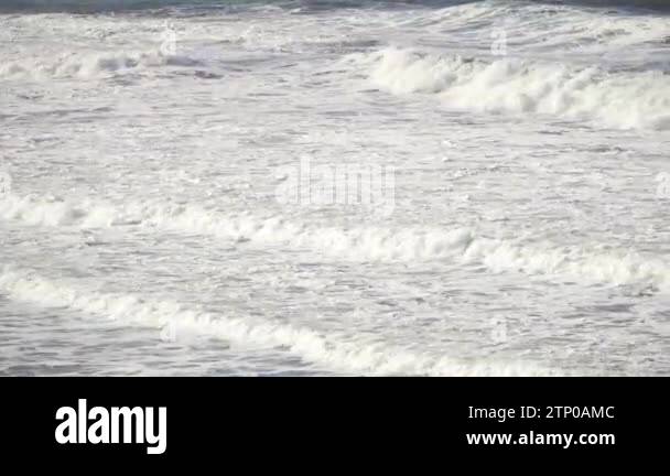Madeira, Portugal - 2023.04.04 - 09: Beautiful waves hitting the Praia da Maiata Beach that is ...