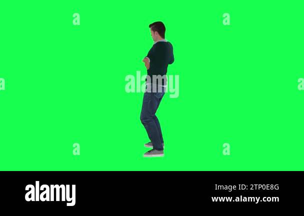 A man with a normal athletic body in green screen with tall height and ...