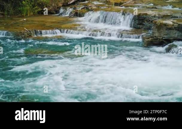 A picturesque tributary of the Niagara River, the water flows through ...