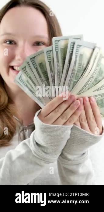 great joy of a teenager the first money earned a lot of dollars 100 ...