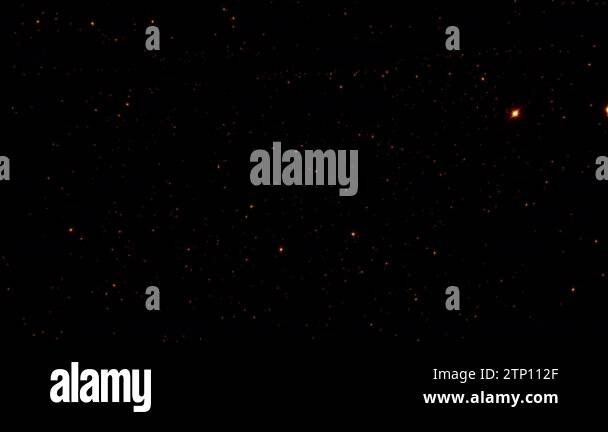 Loop glow orange red stars particles animation on black background flow ...