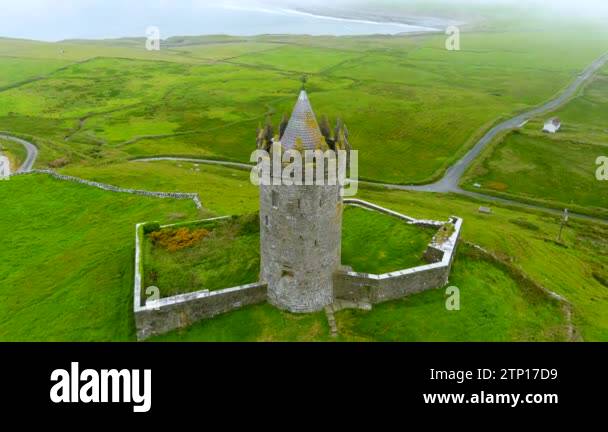 Doonagore Castle aerial foggy view, iconic landmark, one of the most ...