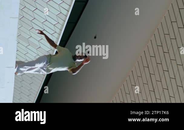 Modern dancer training street alone vertical view. Enthusiastic man ...