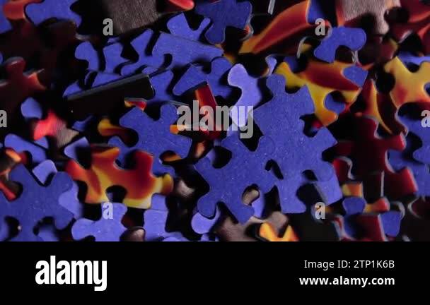Background of Colored Puzzle Pieces that Rotating Clockwise - Top View ...