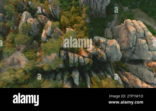 Aerial top-down sunset view of The Prachov Rocks, most famous place in ...