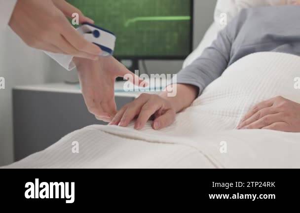Nurse check pulse patient hospital Stock Videos & Footage - HD and 4K ...