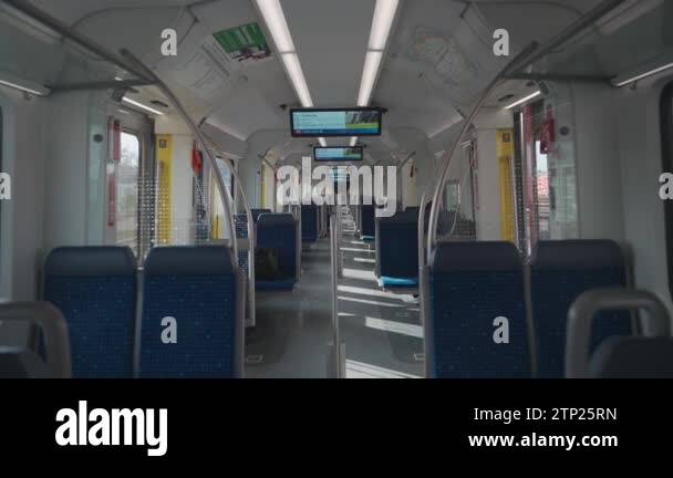 Empty suburban train coach in Munich, Germany. Interior with blue seats ...