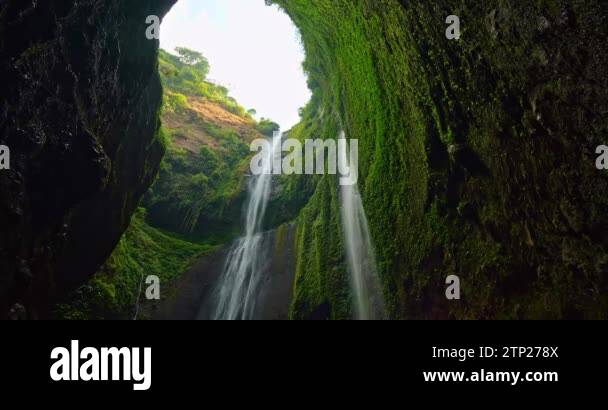 Amazing Beautiful Madakaripura waterfall in tropical rainforest in ...