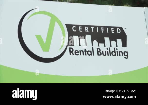 certified rental building writing caption text sign with check mark and ...