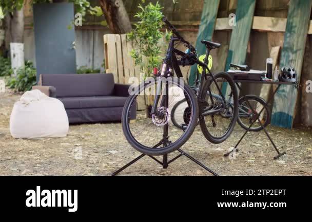 Bicycle resting on workstand with specialized tools tailored for ...