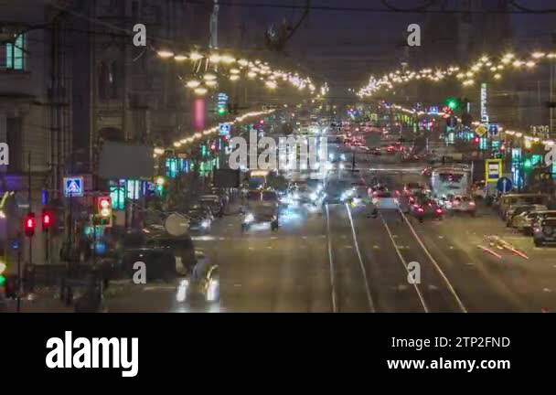 Timelapse reveals night traffic along Liteyny Prospekt with tram rails ...