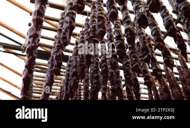 Special Georgian red sweets hanging on strings in resort market ...